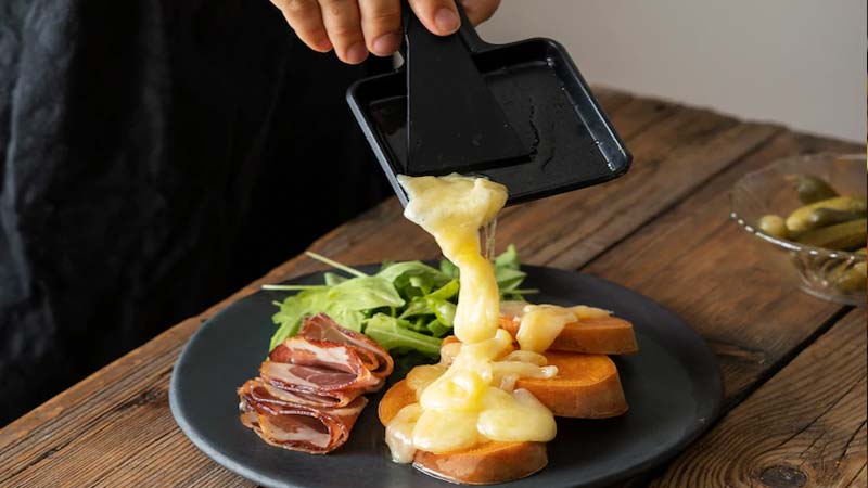 What is Raclette? The other melted cheese dish cooked tableside