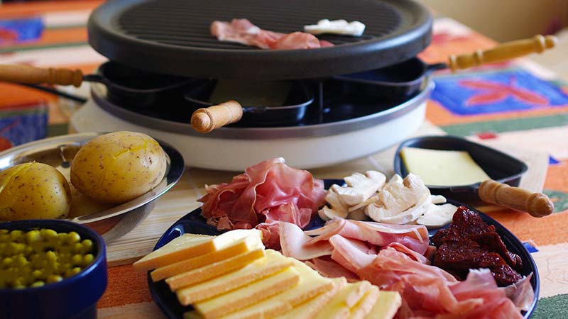 What is Raclette? The other melted cheese dish cooked tableside